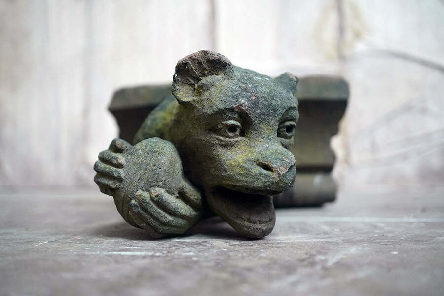 A Rare Medieval Period Carved Stone Grotesque Holding A Coconut C.1300 ...